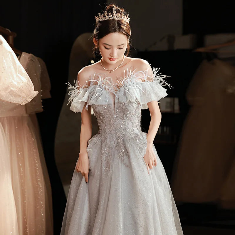 Elegant Off-shoulder Feathered Bridal Gown With Tiara on Luulla