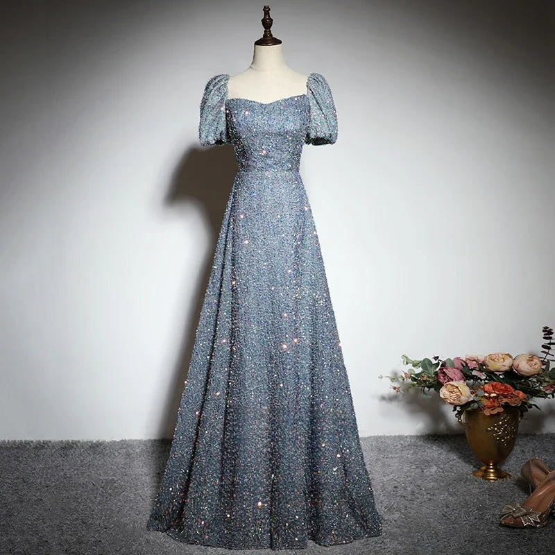 Sparkling Silver Gown With Puff Sleeves Design on Luulla